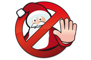 In what year did the English parliament pass a law to make Christmas ...